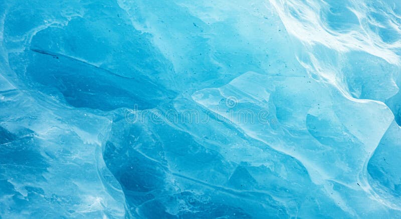 Translucent Blue Ice with Varying Shades and Intricate Patterns of ...