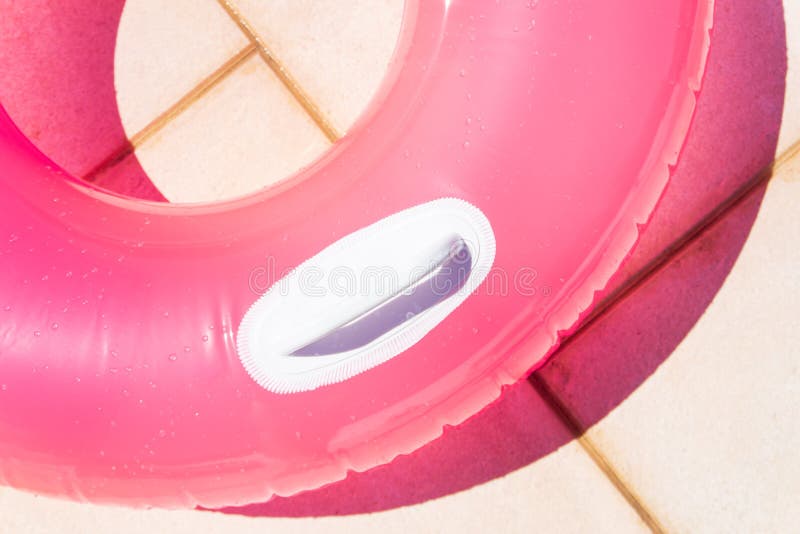 Translucent Pink Swim Ring Under the Bright Sun Stock Image - Image of ...