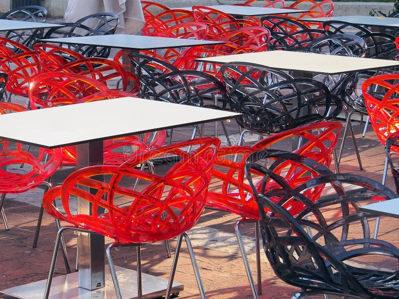 Translucent Plastic Cafe Chairs in Morning Sun. Stock Photo - Image of ...