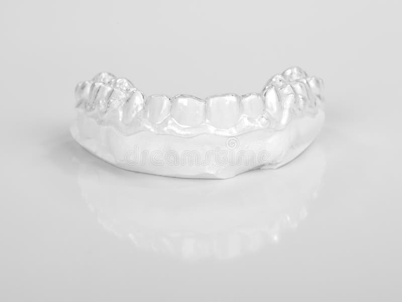 Essix Retainer Surrounded by Orthodontic Appliances and Study Models ...