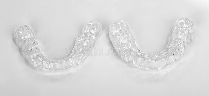 Essix Retainer Surrounded by Orthodontic Appliances and Study Models ...