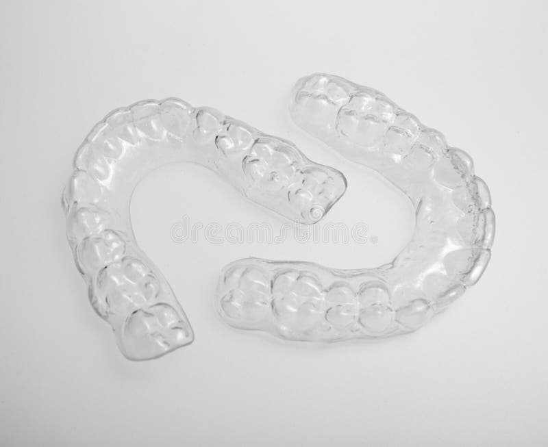 Essix Retainer Surrounded by Orthodontic Appliances and Study Models ...