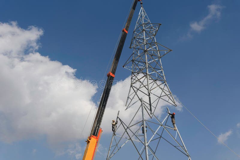 Transmission Tower Construction Under Blue Sky. Stock Image - Image of ...