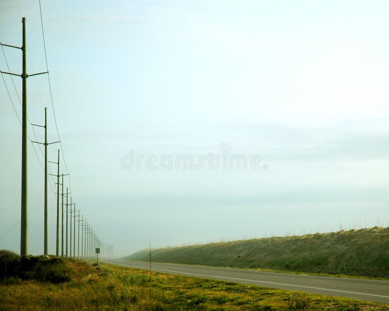 Towers alongside the road stock photo. Image of environmental - 257912080