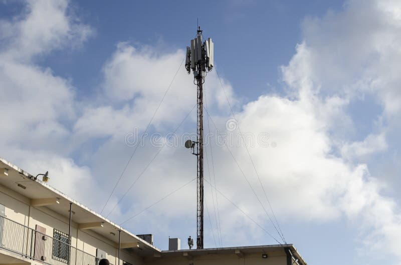 Transmitter on Building Top Stock Photo - Image of pole, antenna: 174715418