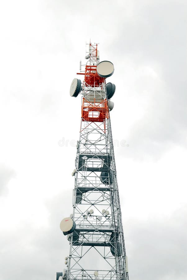 Transmitter Tower with a Background of Blue Sky and Clouds Stock Photo ...