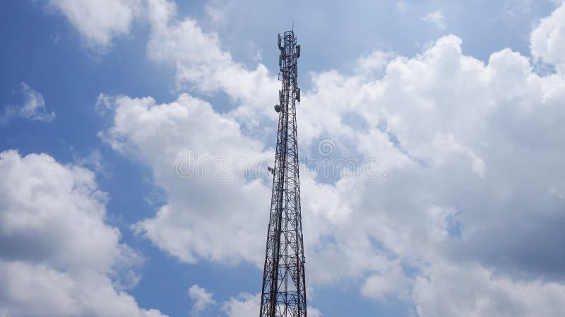 Transmitter Tower with Blue Sky and Clouds Background Stock Photo ...