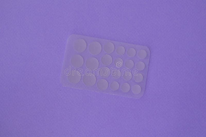 Transparent Acne Patches on Purple Stock Image - Image of problem ...