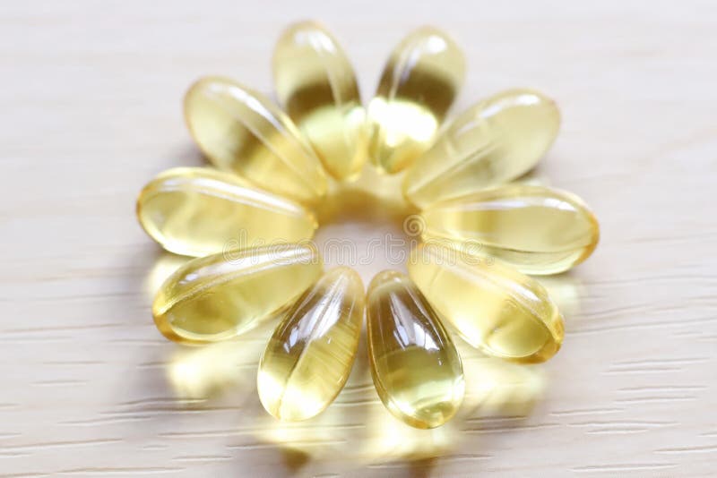 Transparent Capsule Filled with Brown Powder. Single Pill Isolated ...