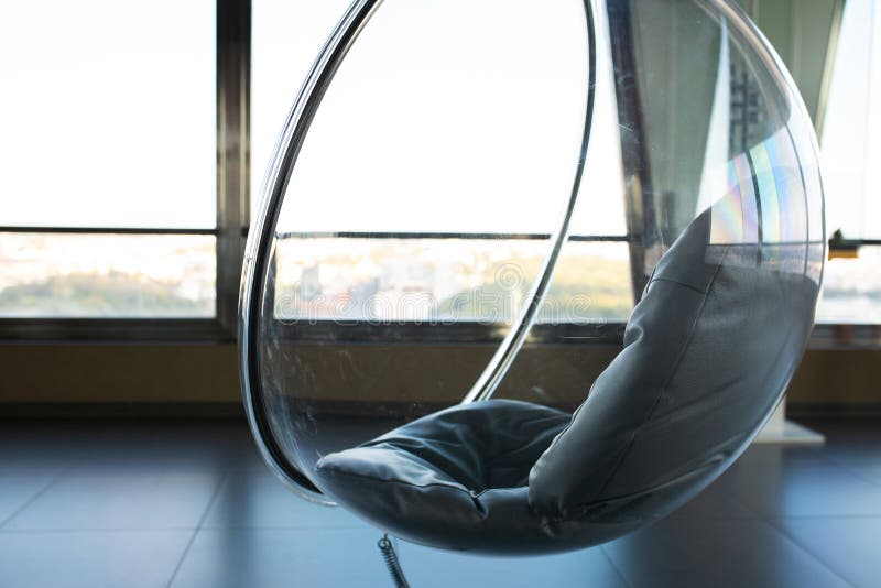 Transparent Chair with Pillow Hanging on the Observation Deck. Empty ...