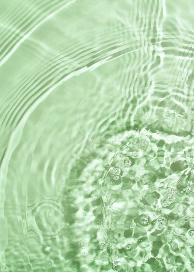 Transparent and Clean Green Water Background with Sunlight Reflection ...