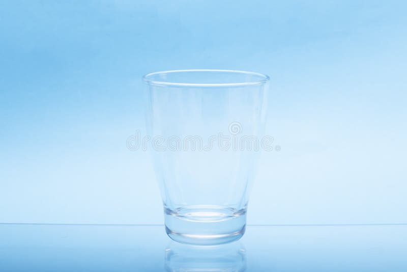 Transparent Empty Water Glasses with Blue Background Stock Photo ...