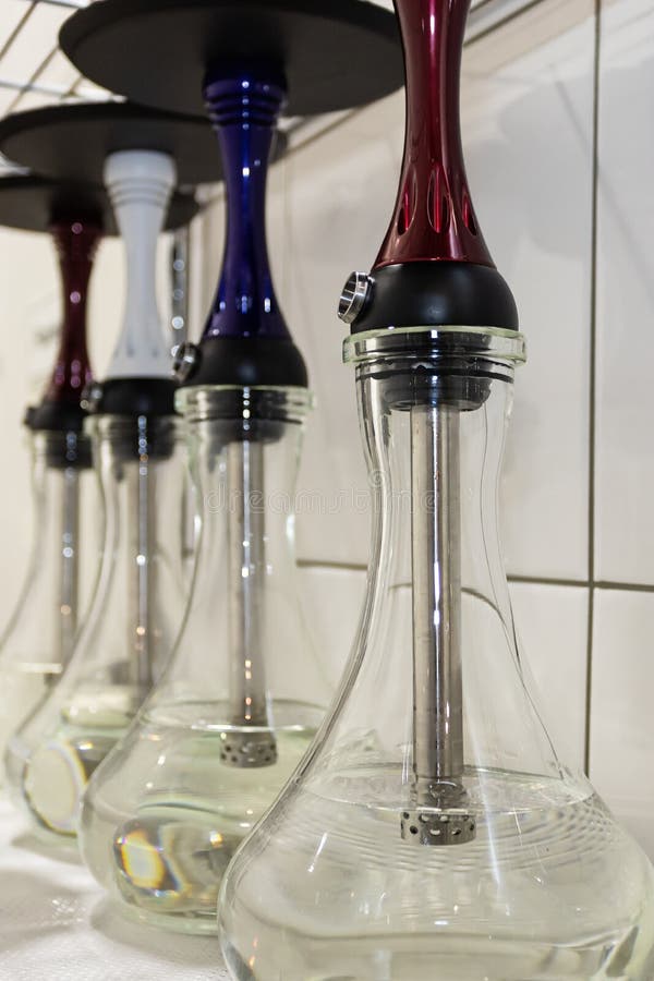 Transparent Glass Flasks Stand in Rows Prepared for Making a Hookah ...