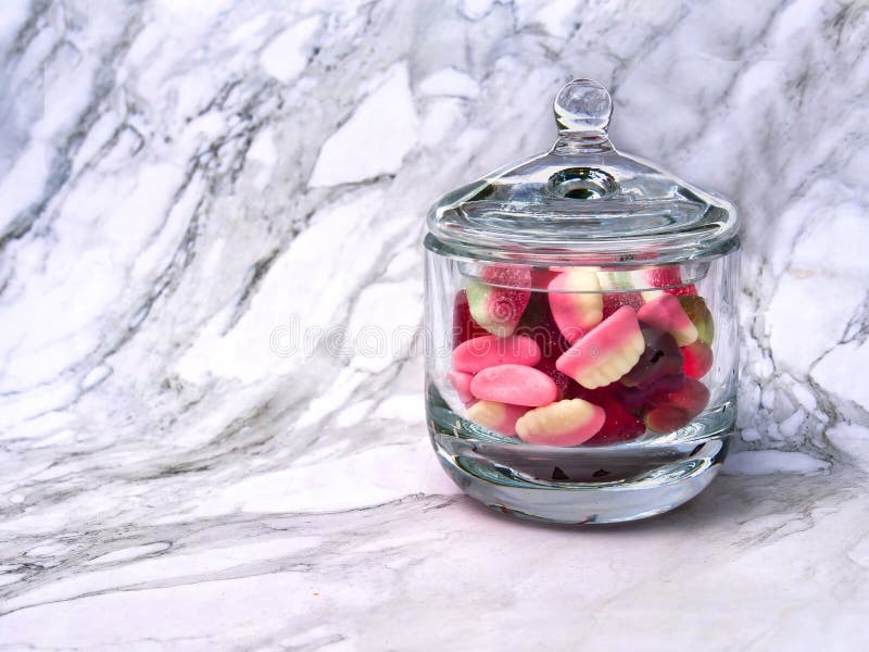 Transparent Glass Jar Filled with Multi-colored Gummies, without Label ...