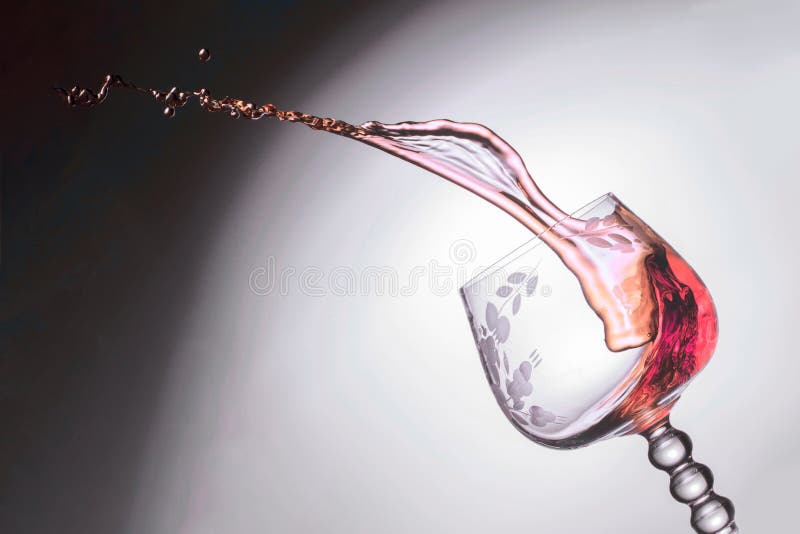 Transparent Glass with a Red Jet of Liquid Up, Close-up Stock Photo ...