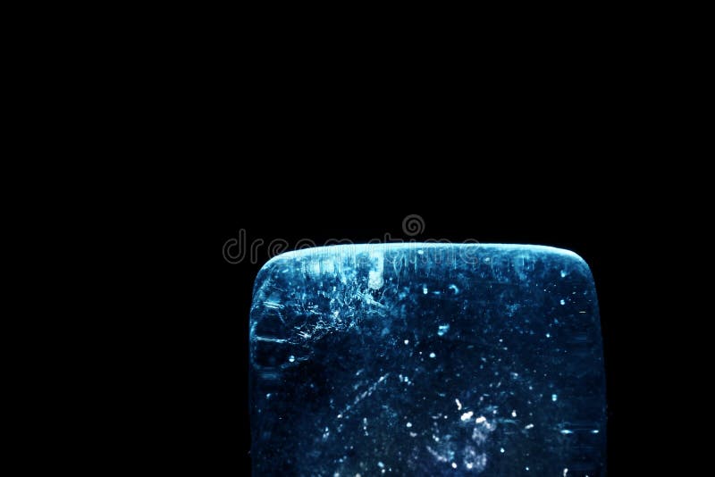 Transparent Glass Stones on a Wooden Surface are Highlighted Stock ...