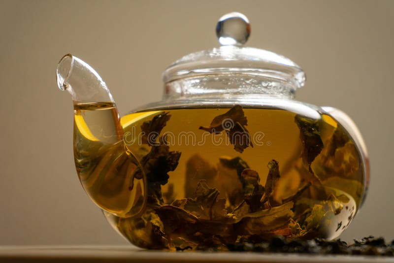 Transparent Glass Teapot with Green Chinese Tea Stock Image - Image of ...