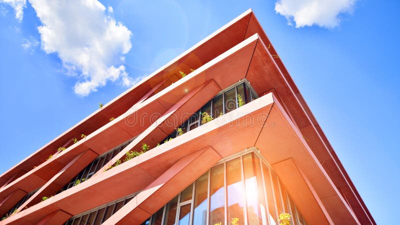 Modern Office Building with Glass Facade on a Clear Sky Background ...