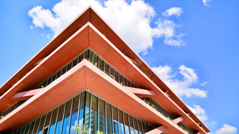 Modern Office Building with Glass Facade on a Clear Sky Background ...