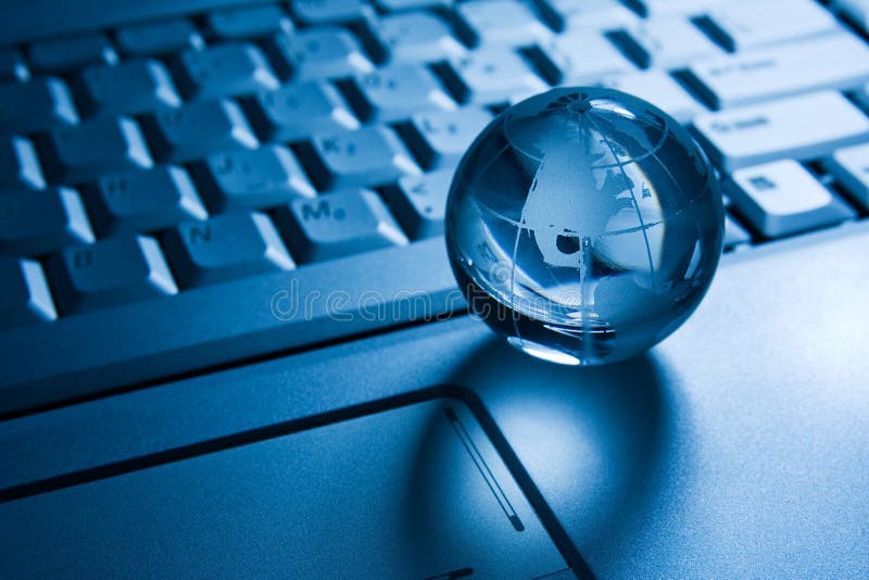 Transparent Globe on a Laptop Keyboard Stock Image - Image of computer ...
