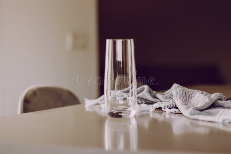 Transparent High Empty Glass on Kitchen Table. Natural Day Light Stock ...
