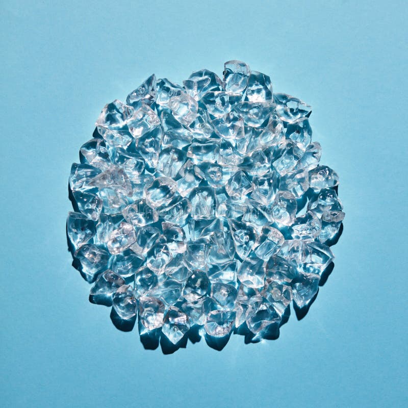 A Circle Made of Transparent Ice Cubes on a Blue Background Stock Photo ...