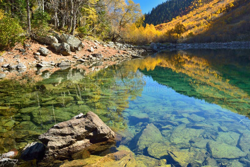 Transparent lake stock photo. Image of mountains, colorful - 48584344