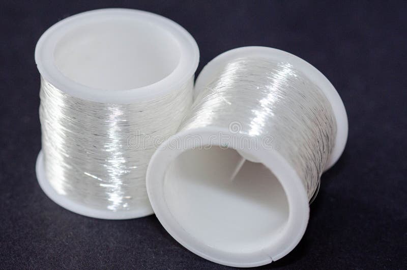 Transparent Nylon Thread on Plastic Spools Closeup Stock Photo - Image ...