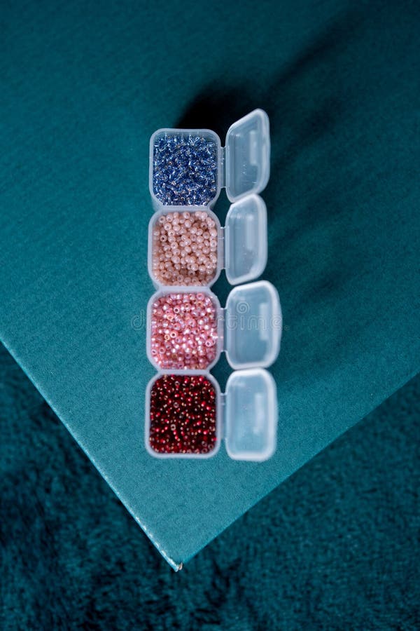 Transparent Open Boxes with Beads on a Plain Background Stock Photo ...