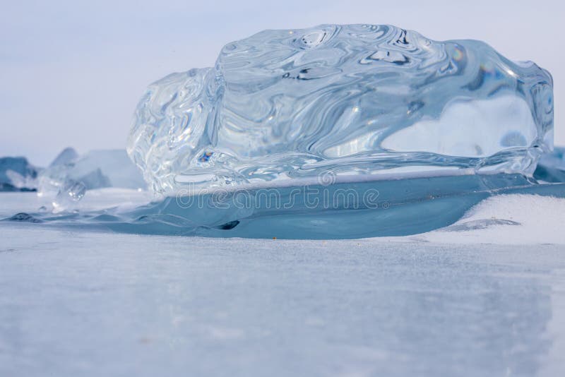 A Transparent Piece of Ice on Surface of Blue Frozen Lake Baikal Stock ...
