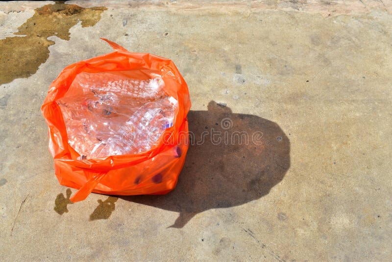 Transparent Plastic Bottles Collected Inside a Bright Orange Plastic ...