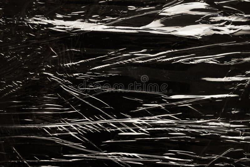 Transparent Plastic Bag Wrap Overlay Texture on Black Background Stock ...