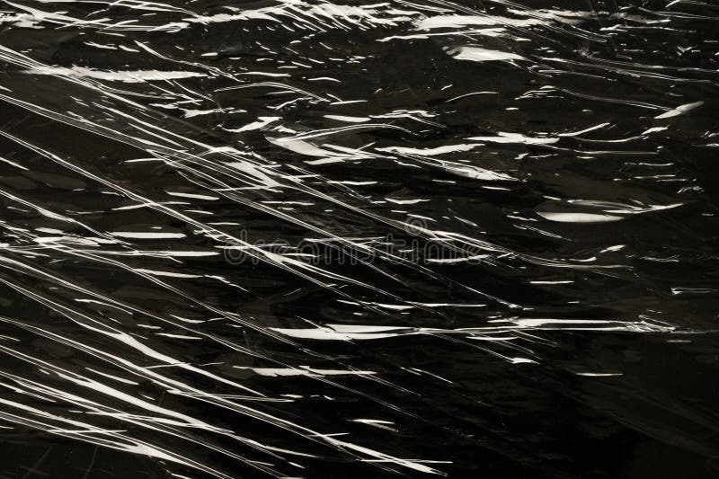 Transparent Plastic Bag Wrap Overlay Texture on Black Background Stock ...