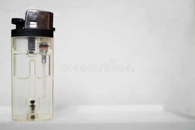 Transparent Plastic Lighter with Brown Cap Stock Photo - Image of ...