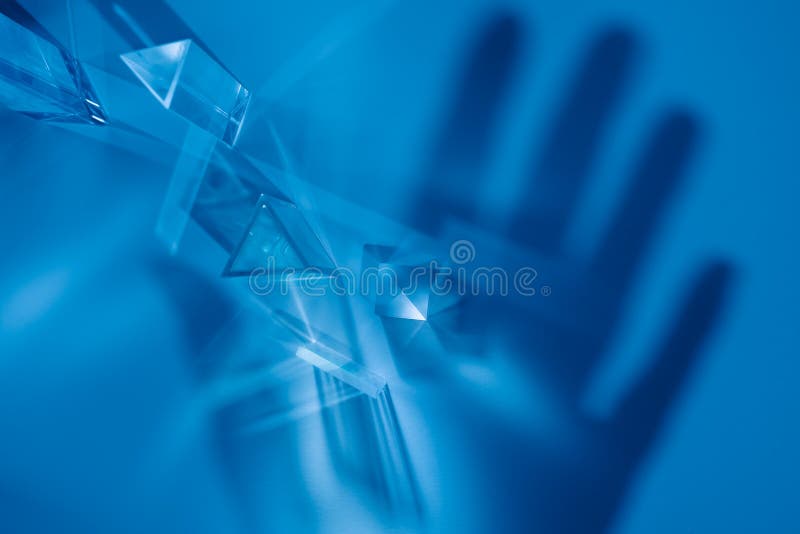 Glass Prisms and Cubes with Color Spectrum Rays. Abstract Background ...