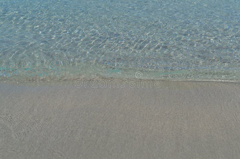 A Transparent Sea Wave Covers the Sandy Beach Stock Photo - Image of ...