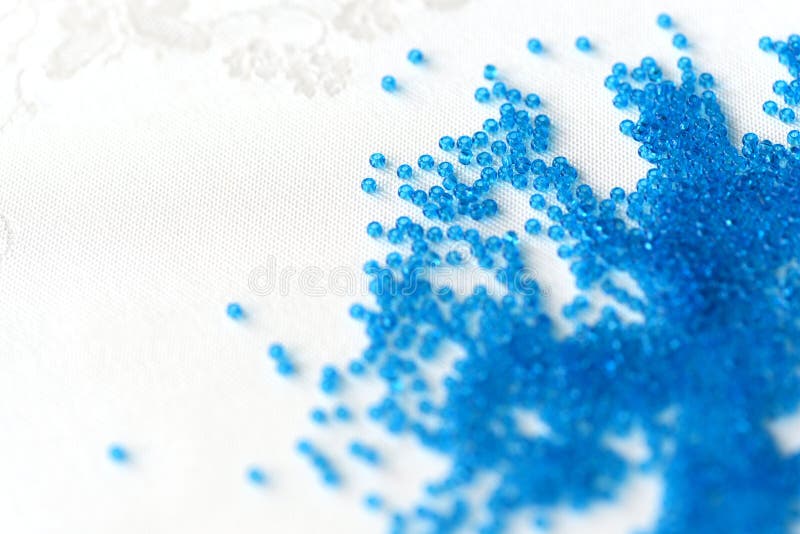 Transparent Seed Beads Blue Color Scattered on a Textile Background ...