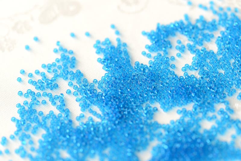 Transparent Seed Beads Blue Color Scattered on a Textile Background ...