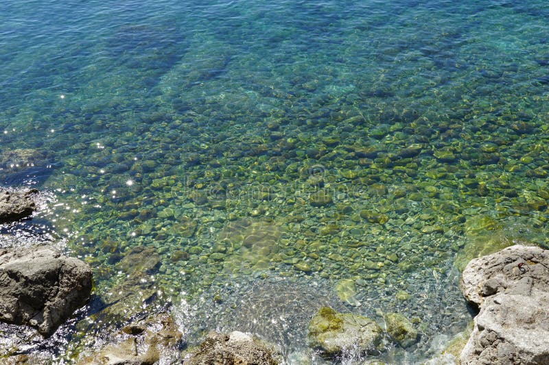 Shallow Seawater on the Pebble Beach between Stony Coast Stock Image ...