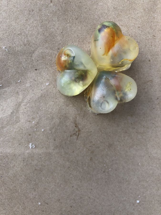 Transparent Soap, Handmade Herbal Soap in the Shape of a Heart on Brown ...