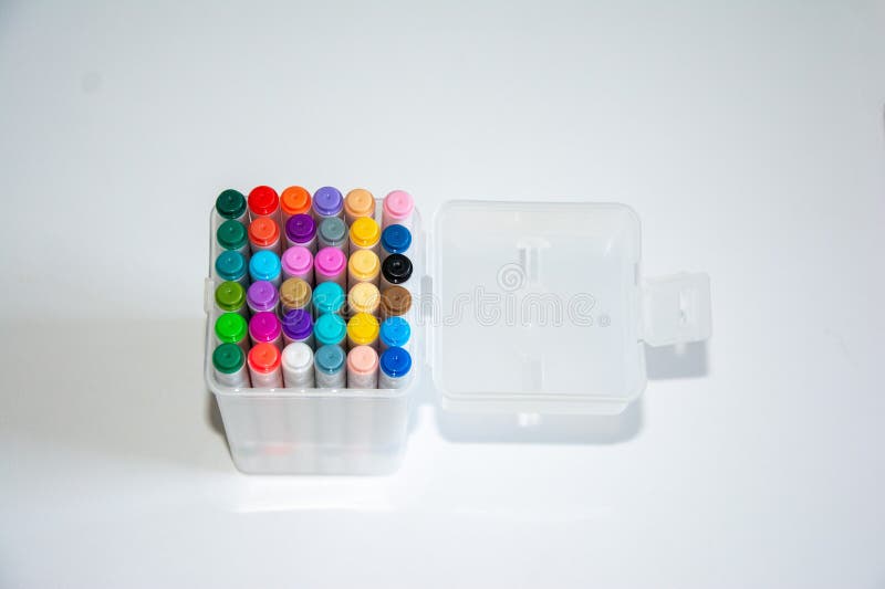 Transparent Square Box Containing Colorful Markers Arranged Neatly ...