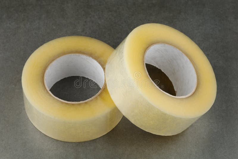 Transparent Tape in Rolls on Concrete Stock Image - Image of material ...