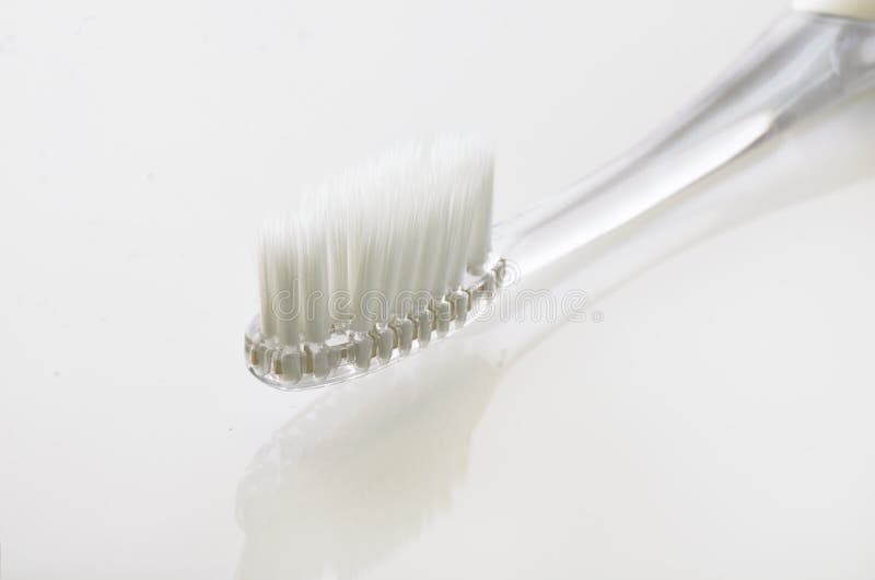 Transparent Toothbrush on White Table Stock Photo - Image of human ...