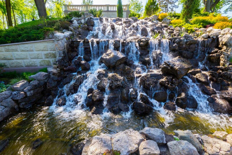 Transparent Water Stream Running Down the Rocks in the Park Stock Image ...