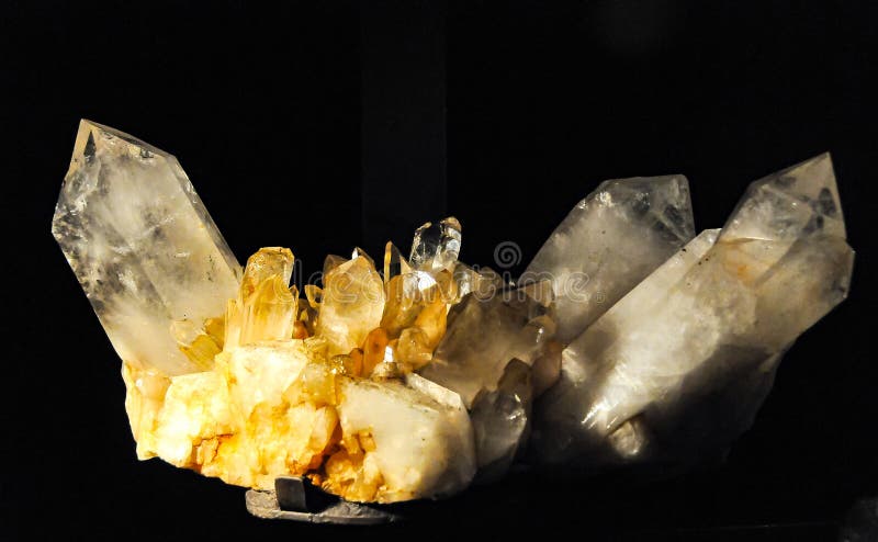 Transparent and Yellow Quartz Crystals on a Black Background Stock ...