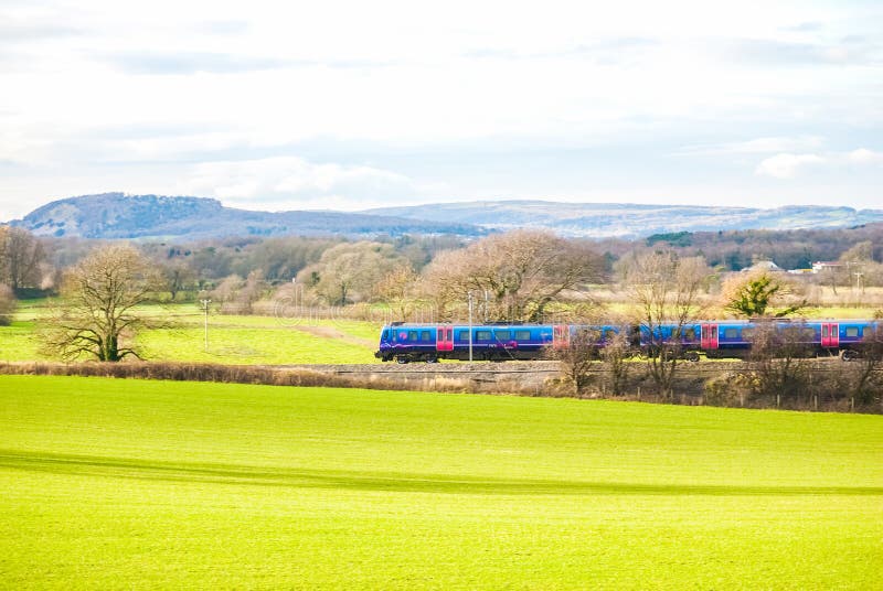Passenger Train In Countryside Stock Photo - Image of journey, country ...