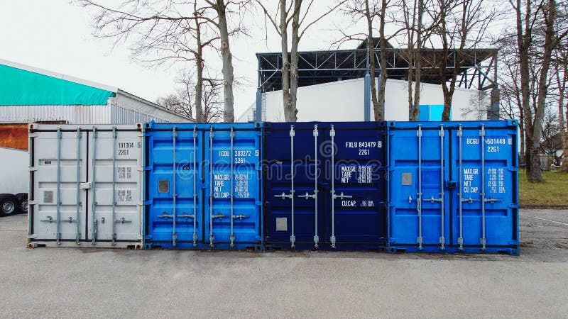Transport Containers Stand in a Row Editorial Photo - Image of economy ...