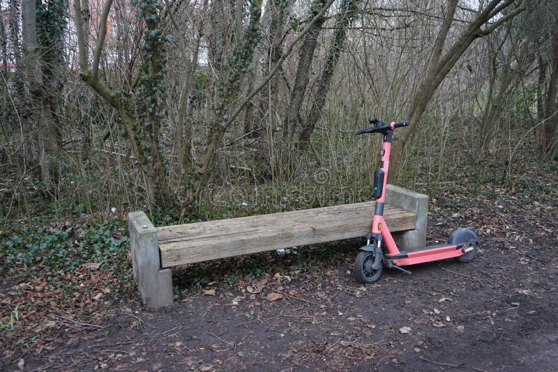 Scooter at the Bench in the Park. Berlin, Germany Stock Photo - Image ...