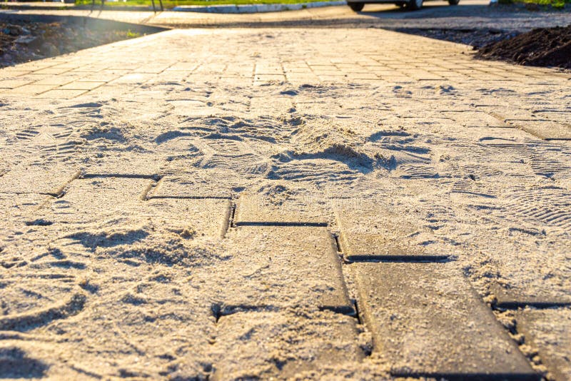 Transport of Sand by Wind or Water Causes Footpaths and Paving Slabs To ...