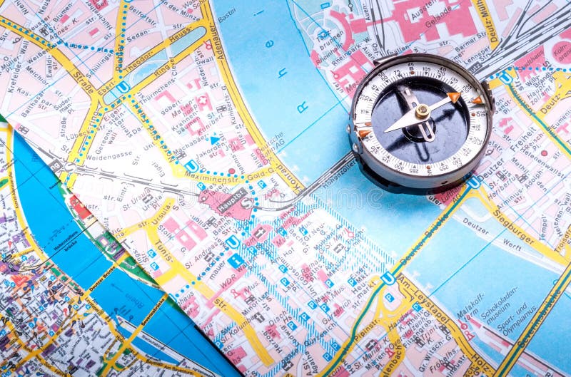 Transport Tourist Map of the City and a Black Compass on it Stock Image ...